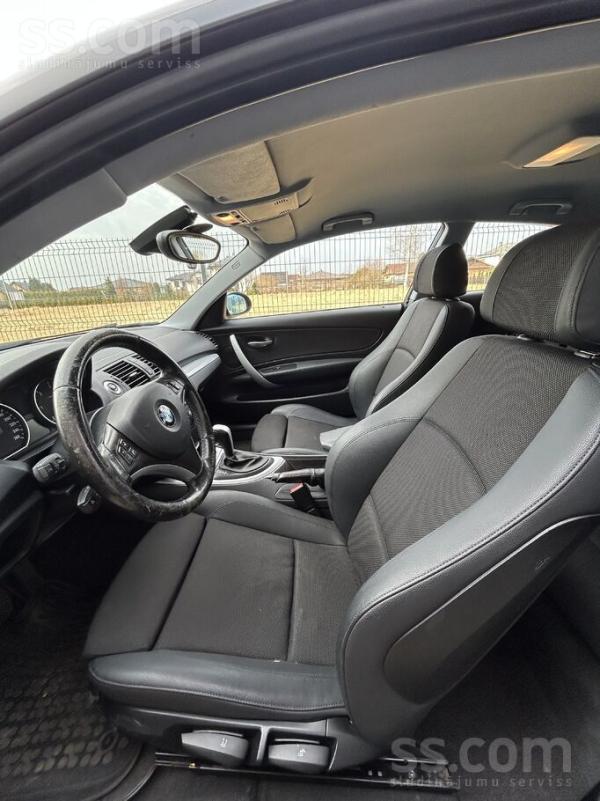 Black BMW 120 2008 in Riga, with an engine capacity of 2.00 L and mileage of 213 thousand km for 3500 €, photo 8 on AUTOMOTO.COM.LV