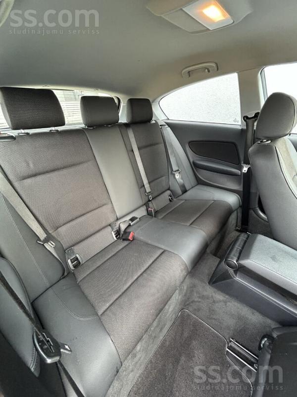 Black BMW 120 2008 in Riga, with an engine capacity of 2.00 L and mileage of 213 thousand km for 3500 €, photo 10 on AUTOMOTO.COM.LV