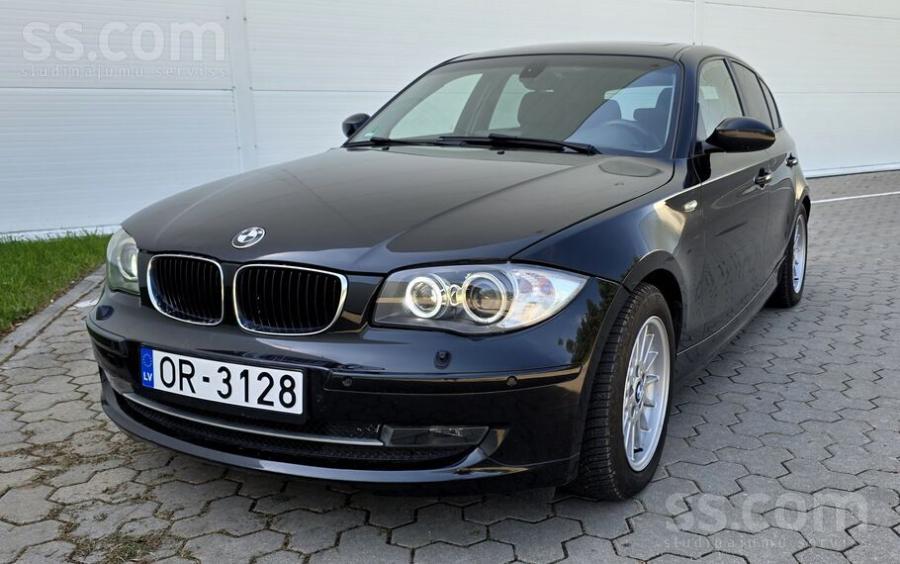 Black BMW 120 2008 in Riga, with an engine capacity of 2.00 L and mileage of 254 thousand km for 4995 €, photo 1 on AUTOMOTO.COM.LV