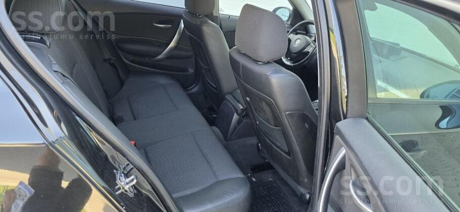 Black BMW 120 2008 in Riga, with an engine capacity of 2.00 L and mileage of 254 thousand km for 4995 €, photo 12 on AUTOMOTO.COM.LV