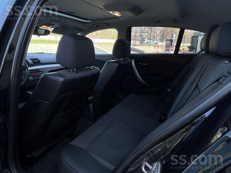 Black BMW 120 2009 in Riga, with an engine capacity of 2.00 L and mileage of 0 thousand km for 4490 €, photo 16 on AUTOMOTO.COM.LV