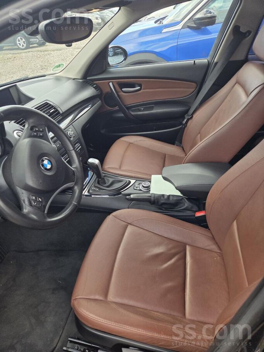 Black BMW 120 2009 in Bauska, with an engine capacity of 2.00 L and mileage of 272 thousand km for 5490 €, photo 5 on AUTOMOTO.COM.LV