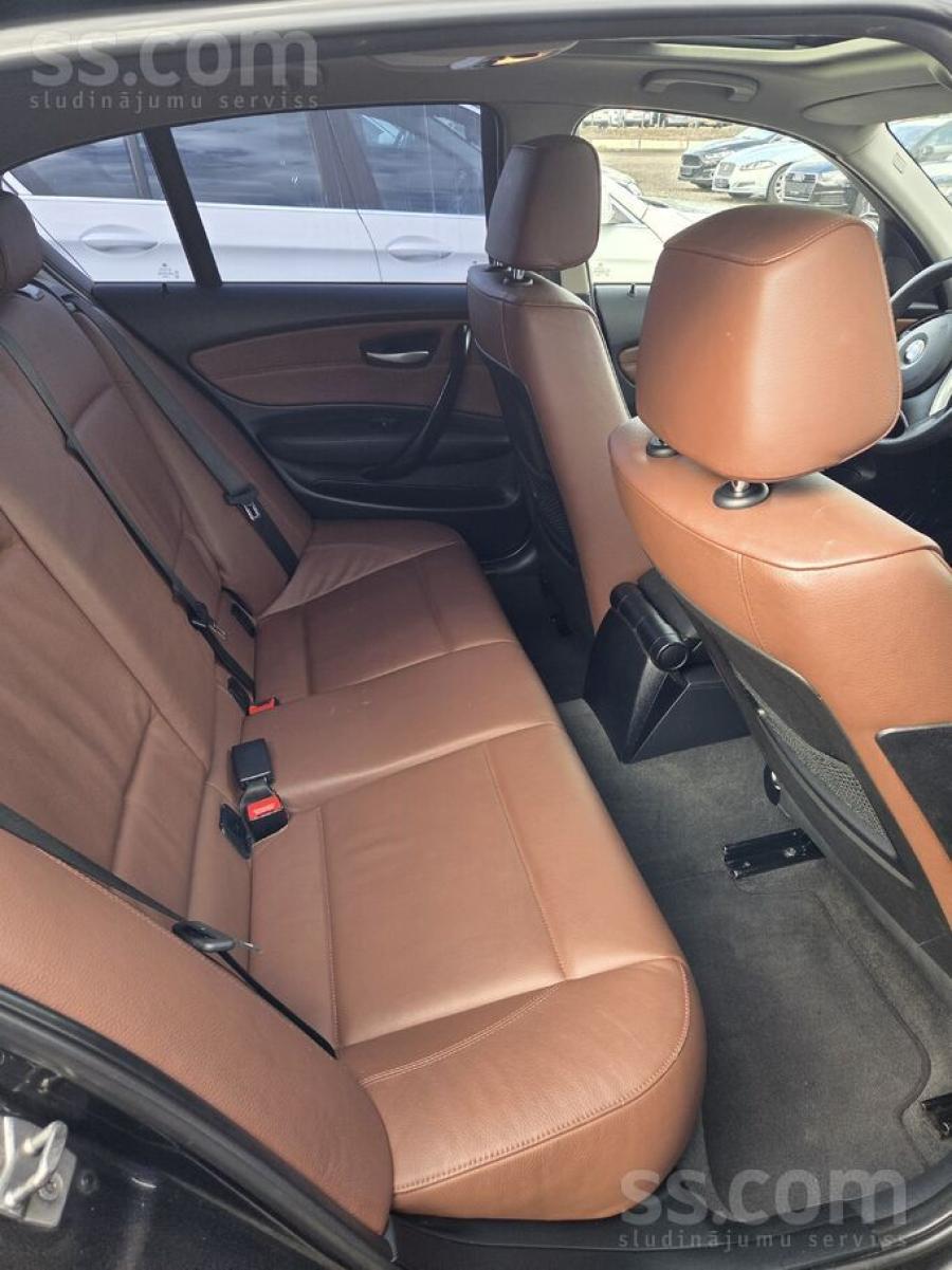 Black BMW 120 2009 in Bauska, with an engine capacity of 2.00 L and mileage of 272 thousand km for 5490 €, photo 7 on AUTOMOTO.COM.LV
