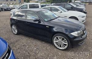 Black BMW 120 2009 in Bauska, with an engine capacity of 2.00 L and mileage of 272 thousand km for 5490 €, photo 14 on AUTOMOTO.COM.LV