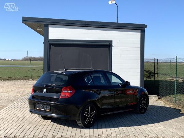 Black BMW 120 2010 in Kaunas, with an engine capacity of 2.00 L and mileage of 301 thousand km for 3999 €, photo 5 on AUTOMOTO.COM.LV
