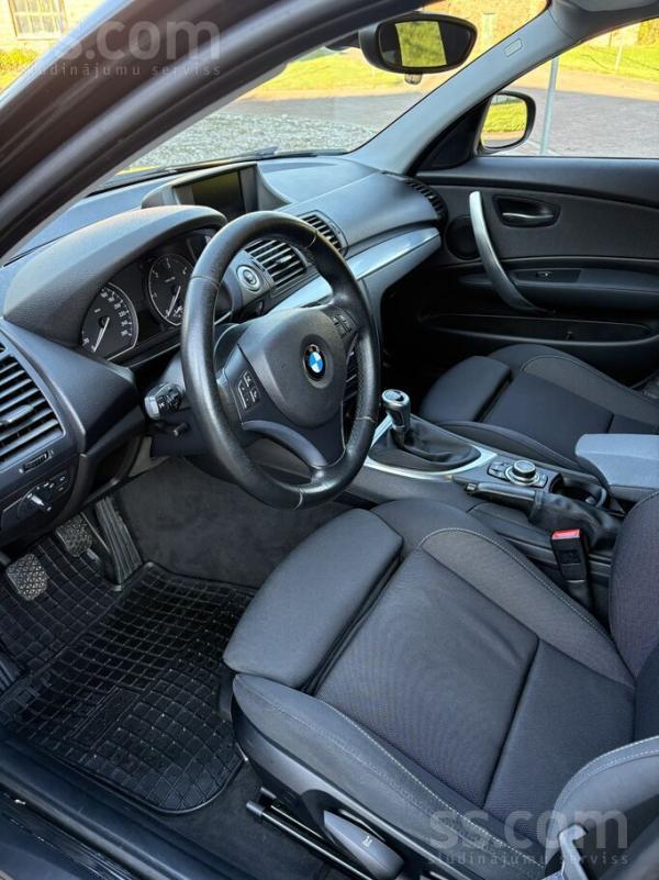 Black BMW 120 2010 in Kuldiga, with an engine capacity of 2.00 L and mileage of 233 thousand km for 4990 €, photo 9 on AUTOMOTO.COM.LV