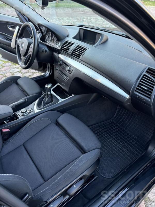 Black BMW 120 2010 in Kuldiga, with an engine capacity of 2.00 L and mileage of 233 thousand km for 4990 €, photo 11 on AUTOMOTO.COM.LV