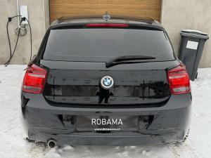Black BMW 120 2011 in Siauliai, with an engine capacity of 2.00 L and mileage of 236 thousand km for 8400 €, photo 4 on AUTOMOTO.COM.LV