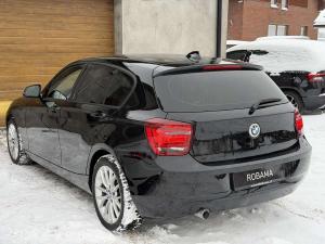 Black BMW 120 2011 in Siauliai, with an engine capacity of 2.00 L and mileage of 236 thousand km for 8400 €, photo 5 on AUTOMOTO.COM.LV