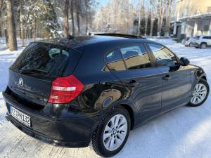 Black BMW 120 2011 in Prienai, with an engine capacity of 2.00 L and mileage of 286 thousand km for 5499 €, photo 3 on AUTOMOTO.COM.LV