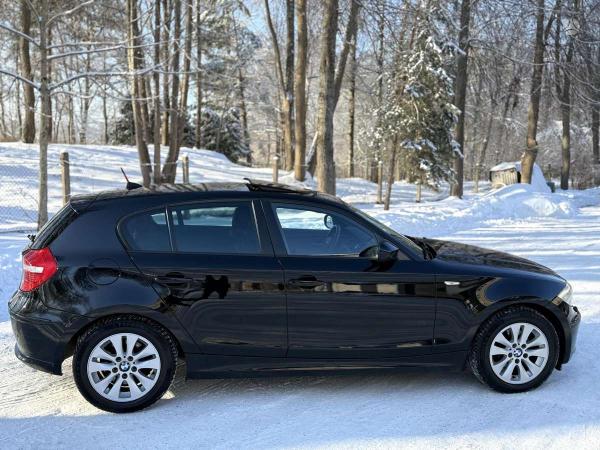 Black BMW 120 2011 in Prienai, with an engine capacity of 2.00 L and mileage of 286 thousand km for 5499 €, photo 7 on AUTOMOTO.COM.LV
