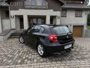 Black BMW 120 2011 in Cesis, with an engine capacity of 2.00 L and mileage of 299 thousand km for 4950 €, photo 5 on AUTOMOTO.COM.LV