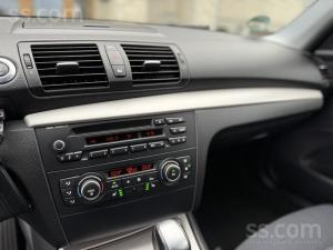 Black BMW 120 2011 in Cesis, with an engine capacity of 2.00 L and mileage of 299 thousand km for 4950 €, photo 13 on AUTOMOTO.COM.LV
