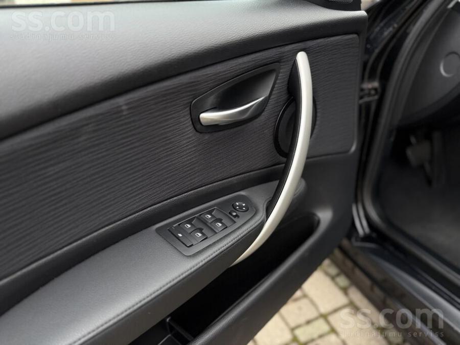 Black BMW 120 2011 in Cesis, with an engine capacity of 2.00 L and mileage of 299 thousand km for 4950 €, photo 16 on AUTOMOTO.COM.LV