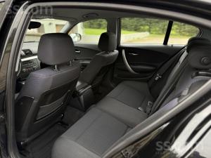 Black BMW 120 2011 in Cesis, with an engine capacity of 2.00 L and mileage of 299 thousand km for 4950 €, photo 19 on AUTOMOTO.COM.LV