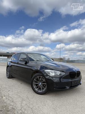 Black BMW 120 2012 in Siauliai, with an engine capacity of 2.00 L and mileage of 318 thousand km for 5250 €, photo  on AUTOMOTO.COM.LV