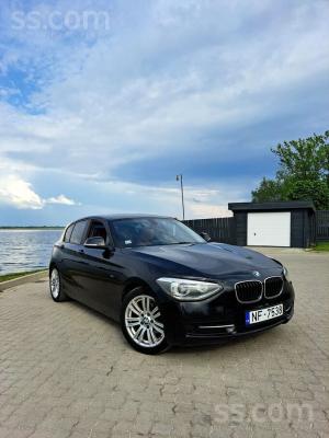 Black BMW 120 2012 in Riga, with an engine capacity of 2.00 L and mileage of 315 thousand km for 6890 €, photo  on AUTOMOTO.COM.LV
