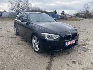Black BMW 120 2012 in Riga, with an engine capacity of 2.00 L and mileage of 0 thousand km for 8999 €, photo 4 on AUTOMOTO.COM.LV