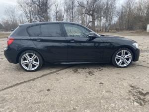 Black BMW 120 2012 in Riga, with an engine capacity of 2.00 L and mileage of 0 thousand km for 8999 €, photo 5 on AUTOMOTO.COM.LV