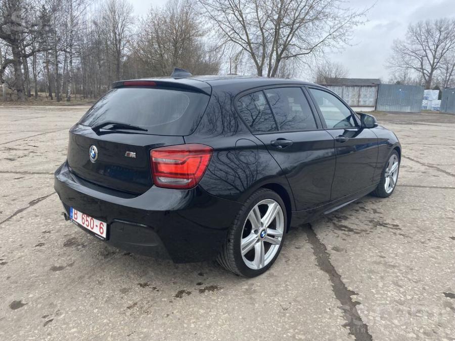 Black BMW 120 2012 in Riga, with an engine capacity of 2.00 L and mileage of 0 thousand km for 8999 €, photo 6 on AUTOMOTO.COM.LV
