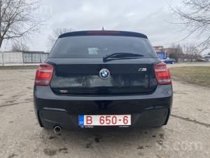 Black BMW 120 2012 in Riga, with an engine capacity of 2.00 L and mileage of 0 thousand km for 8999 €, photo 7 on AUTOMOTO.COM.LV
