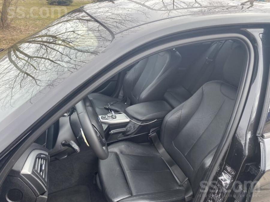 Black BMW 120 2012 in Riga, with an engine capacity of 2.00 L and mileage of 0 thousand km for 8999 €, photo 10 on AUTOMOTO.COM.LV