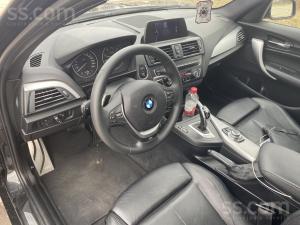 Black BMW 120 2012 in Riga, with an engine capacity of 2.00 L and mileage of 0 thousand km for 8999 €, photo 11 on AUTOMOTO.COM.LV