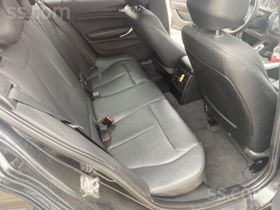 Black BMW 120 2012 in Riga, with an engine capacity of 2.00 L and mileage of 0 thousand km for 8999 €, photo 12 on AUTOMOTO.COM.LV