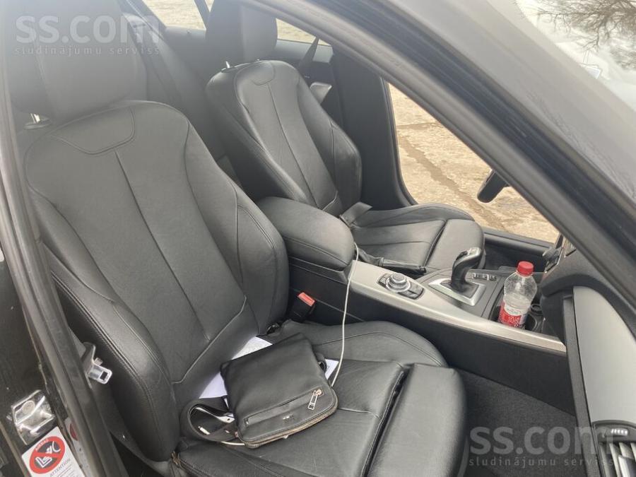 Black BMW 120 2012 in Riga, with an engine capacity of 2.00 L and mileage of 0 thousand km for 8999 €, photo 14 on AUTOMOTO.COM.LV