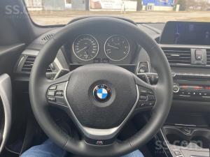 Black BMW 120 2012 in Riga, with an engine capacity of 2.00 L and mileage of 0 thousand km for 8999 €, photo 16 on AUTOMOTO.COM.LV