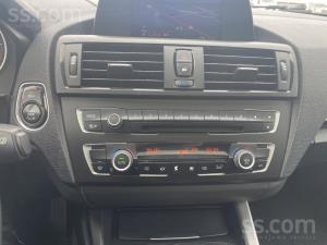 Black BMW 120 2012 in Riga, with an engine capacity of 2.00 L and mileage of 0 thousand km for 8999 €, photo 21 on AUTOMOTO.COM.LV