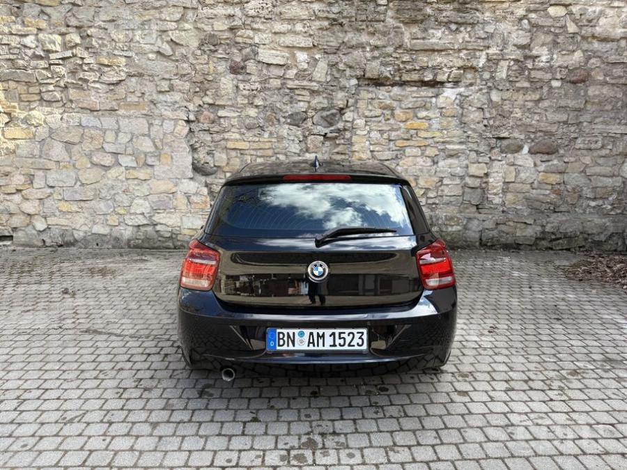 Black BMW 120 2012 in Cesis, with an engine capacity of 2.00 L and mileage of 273 thousand km for 6950 €, photo 6 on AUTOMOTO.COM.LV