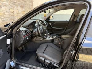 Black BMW 120 2012 in Cesis, with an engine capacity of 2.00 L and mileage of 273 thousand km for 6950 €, photo 9 on AUTOMOTO.COM.LV