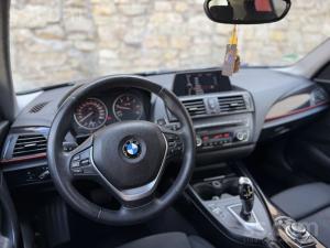 Black BMW 120 2012 in Cesis, with an engine capacity of 2.00 L and mileage of 273 thousand km for 6950 €, photo 11 on AUTOMOTO.COM.LV