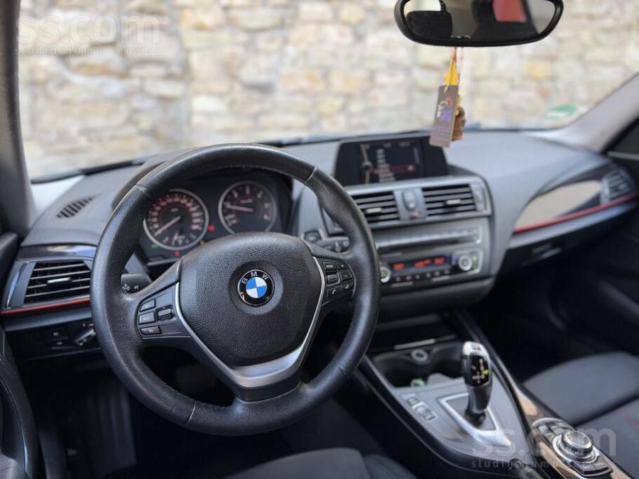 Black BMW 120 2012 in Cesis, with an engine capacity of 2.00 L and mileage of 273 thousand km for 6950 €, photo 11 on AUTOMOTO.COM.LV