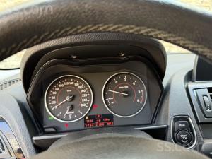 Black BMW 120 2012 in Cesis, with an engine capacity of 2.00 L and mileage of 273 thousand km for 6950 €, photo 12 on AUTOMOTO.COM.LV