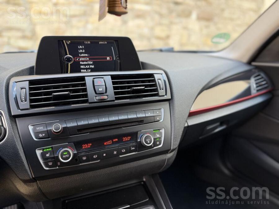 Black BMW 120 2012 in Cesis, with an engine capacity of 2.00 L and mileage of 273 thousand km for 6950 €, photo 13 on AUTOMOTO.COM.LV