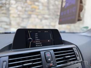 Black BMW 120 2012 in Cesis, with an engine capacity of 2.00 L and mileage of 273 thousand km for 6950 €, photo 15 on AUTOMOTO.COM.LV