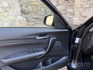 Black BMW 120 2012 in Cesis, with an engine capacity of 2.00 L and mileage of 273 thousand km for 6950 €, photo 16 on AUTOMOTO.COM.LV