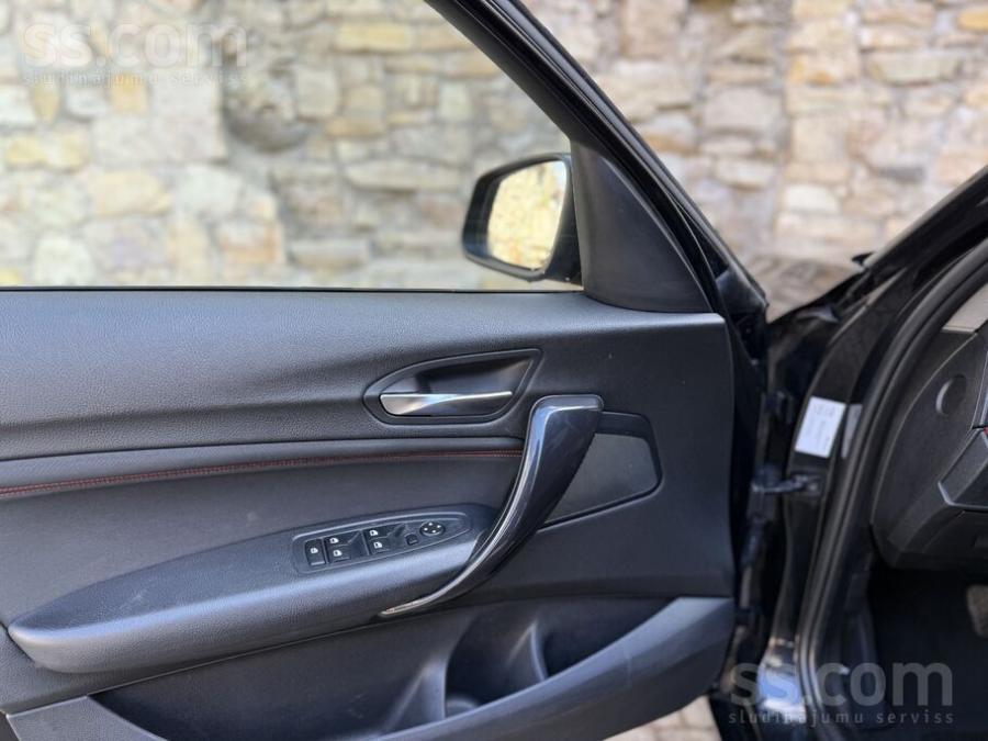 Black BMW 120 2012 in Cesis, with an engine capacity of 2.00 L and mileage of 273 thousand km for 6950 €, photo 16 on AUTOMOTO.COM.LV