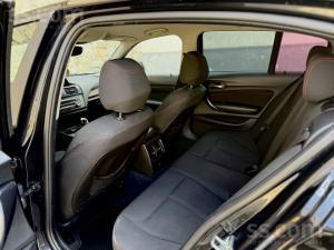 Black BMW 120 2012 in Cesis, with an engine capacity of 2.00 L and mileage of 273 thousand km for 6950 €, photo 17 on AUTOMOTO.COM.LV