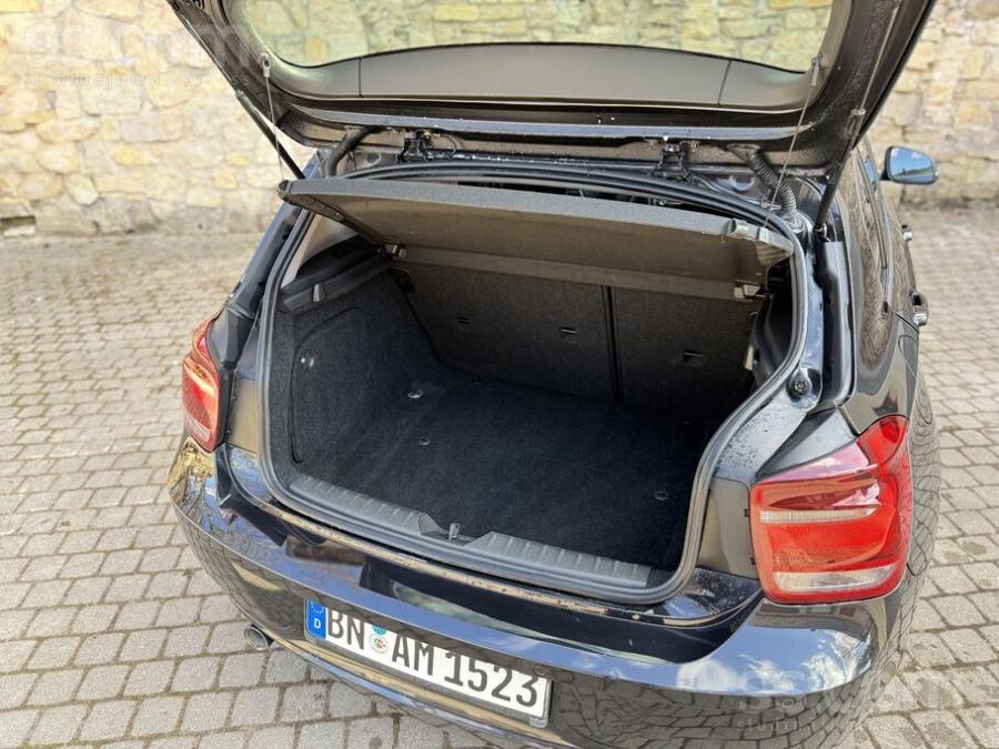 Black BMW 120 2012 in Cesis, with an engine capacity of 2.00 L and mileage of 273 thousand km for 6950 €, photo 18 on AUTOMOTO.COM.LV