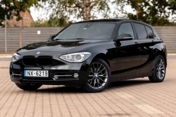 Black BMW 120 2012 in Riga, with an engine capacity of 2.00 L and mileage of 330 thousand km for 10900 €, photo 1 on AUTOMOTO.COM.LV