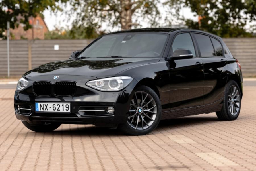 Black BMW 120 2012 in Riga, with an engine capacity of 2.00 L and mileage of 330 thousand km for 10900 €, photo 1 on AUTOMOTO.COM.LV