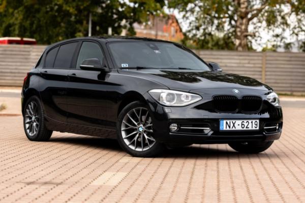 Black BMW 120 2012 in Riga, with an engine capacity of 2.00 L and mileage of 330 thousand km for 10900 €, photo 2 on AUTOMOTO.COM.LV