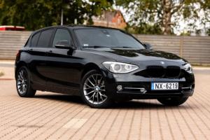 Black BMW 120 2012 in Riga, with an engine capacity of 2.00 L and mileage of 330 thousand km for 10900 €, photo 3 on AUTOMOTO.COM.LV