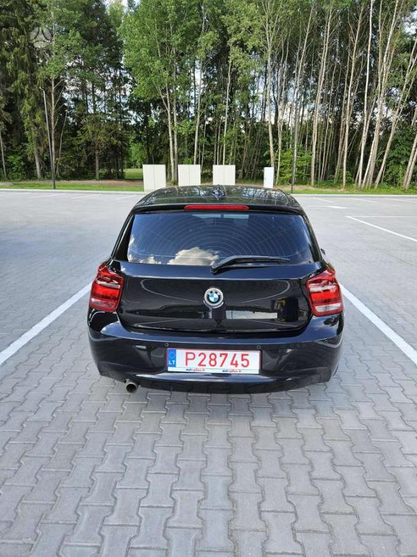 Black BMW 120 2012 in Raseiniai, with an engine capacity of 2.00 L and mileage of 311 thousand km for 7599 €, photo 3 on AUTOMOTO.COM.LV