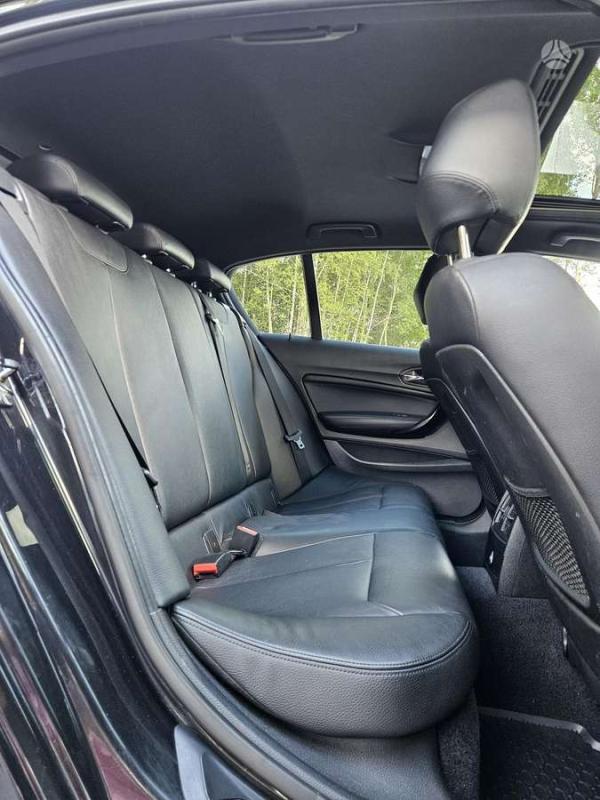 Black BMW 120 2012 in Raseiniai, with an engine capacity of 2.00 L and mileage of 311 thousand km for 7599 €, photo 8 on AUTOMOTO.COM.LV