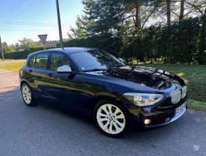 Black BMW 120 2012 in Taurage, with an engine capacity of 2.00 L and mileage of 228 thousand km for 5850 €, photo 6 on AUTOMOTO.COM.LV