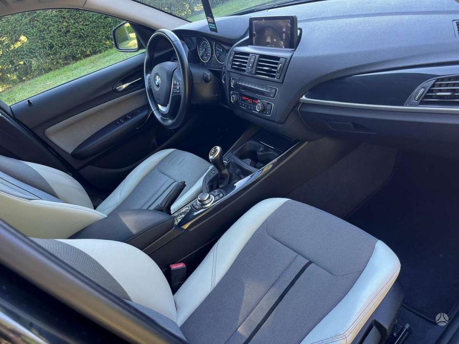 Black BMW 120 2012 in Taurage, with an engine capacity of 2.00 L and mileage of 228 thousand km for 5850 €, photo 14 on AUTOMOTO.COM.LV